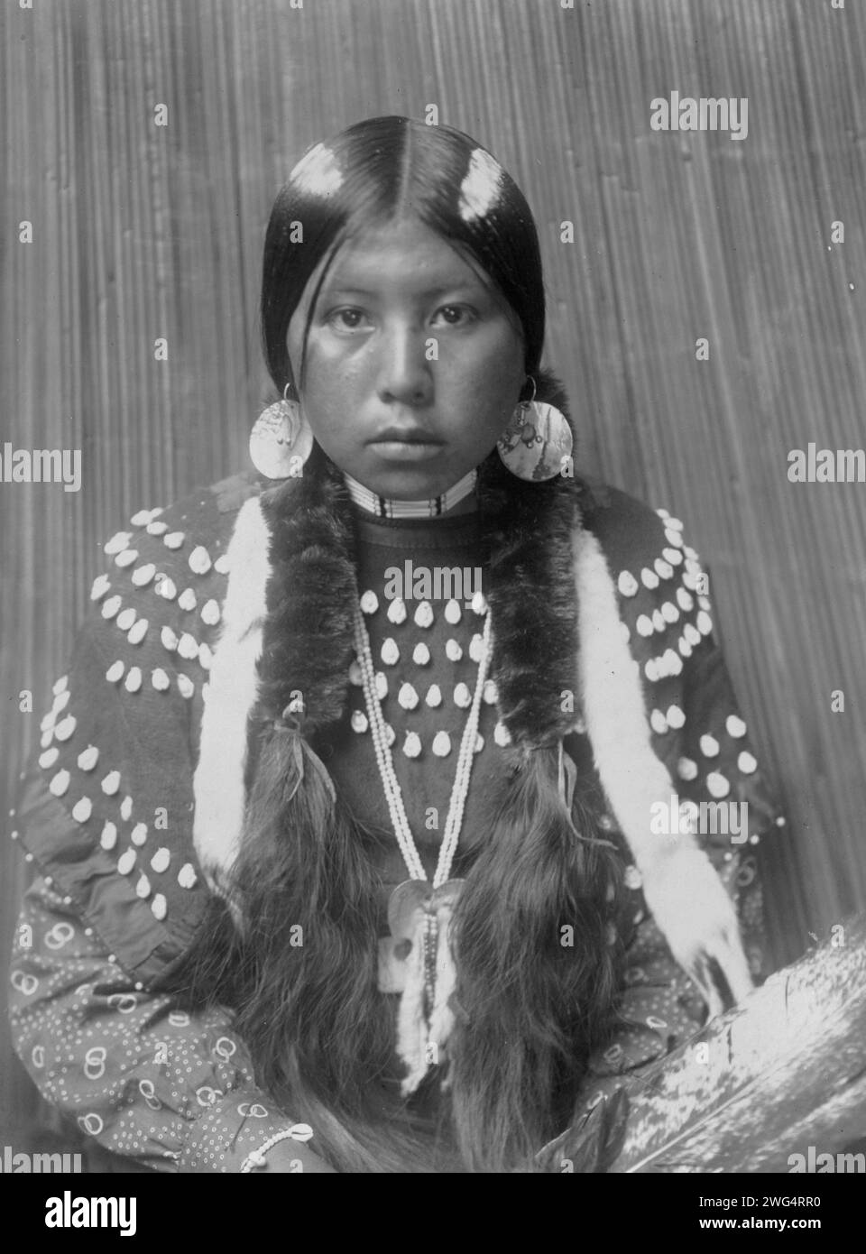 Dusty Dress, c1910. Kalispel Indian woman, half-length portrait, facing ...