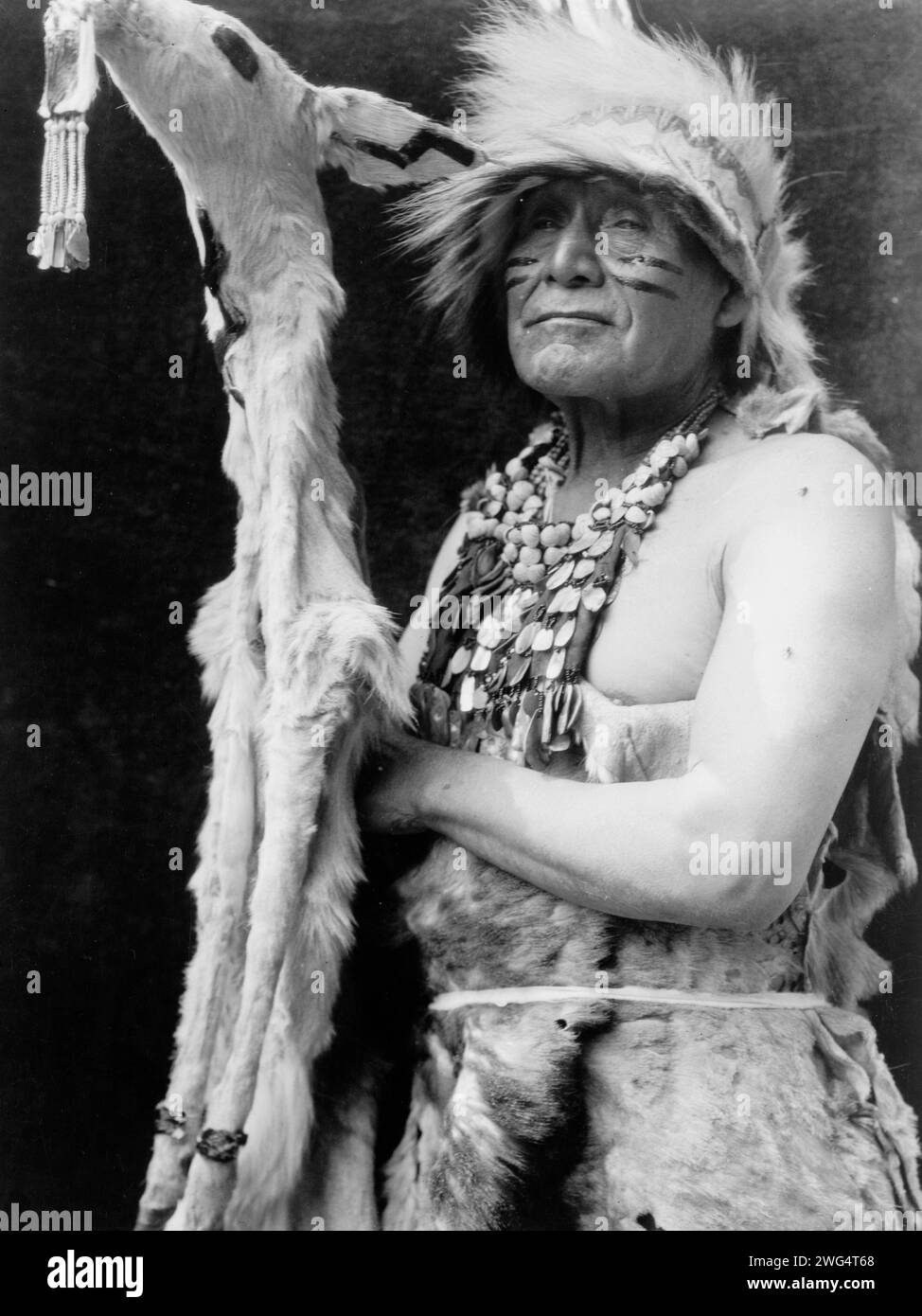 White deerskin dance costume-Hupa, c1923. Hupa Indian, half-length ...