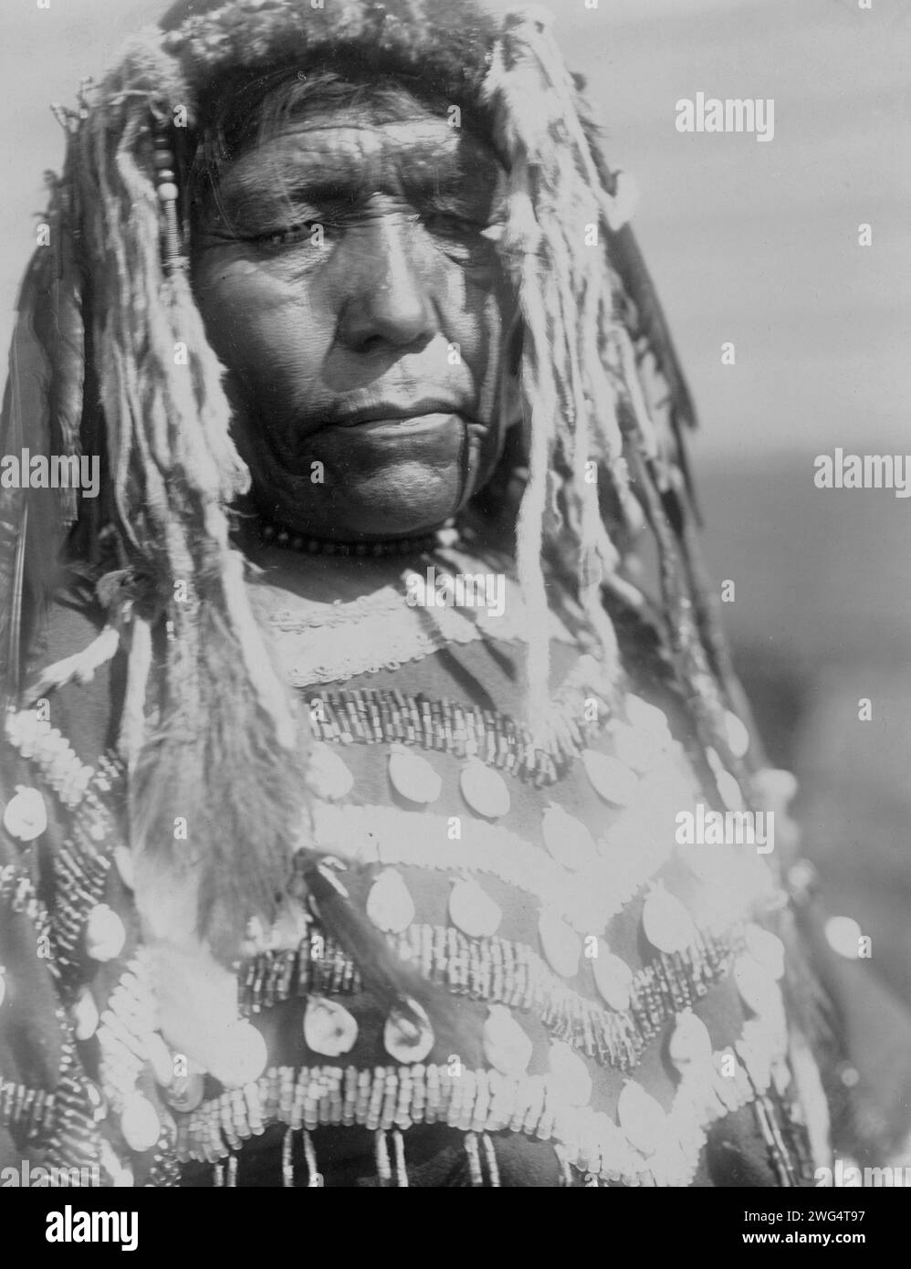 Wife of Weasel Head-Piegan, c1910. Piegan woman, half-length portrait ...