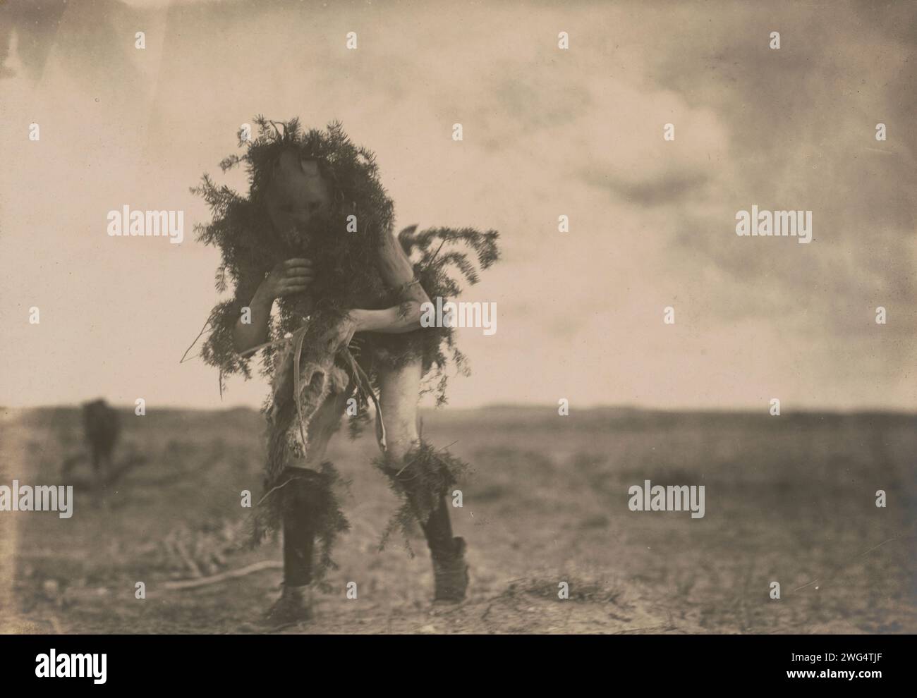 Yeibichai, the beggar, Tonenili-Navajo Indian, dressed in spruce ...