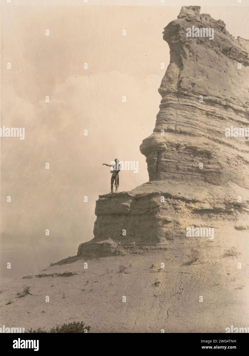 The offering-San Ildefonso, c1927. Photograph shows a barechested Tewa ...