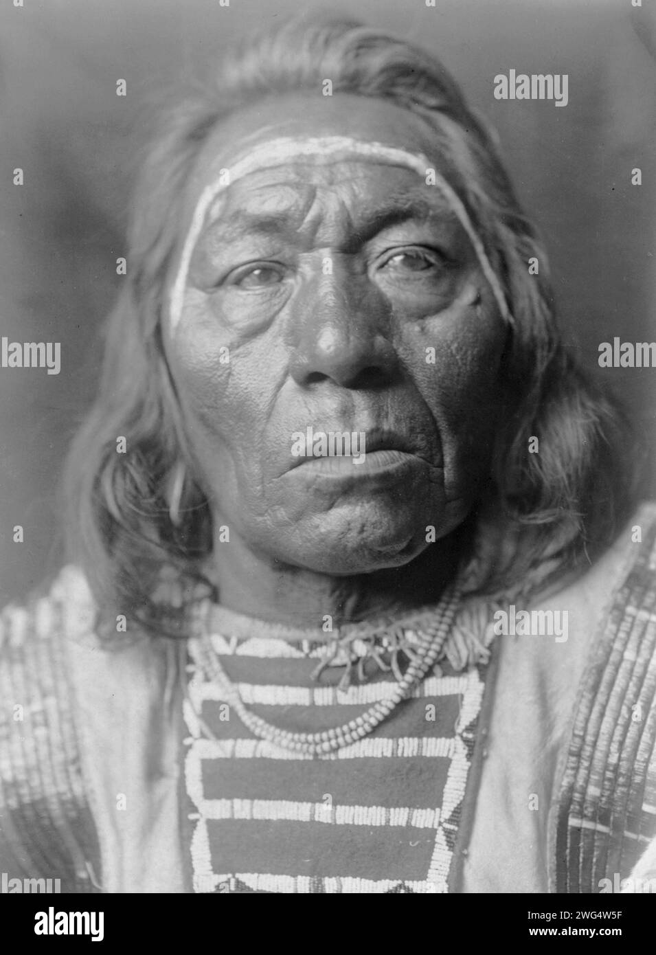 Leads the Wolf, c1908. Head-and-shoulders portrait of Crow man Stock ...