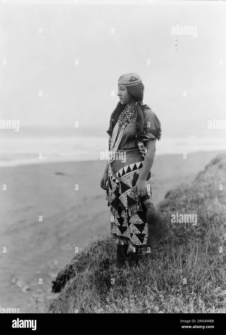 Woman's primitive dress-Tolowa, c1923. Ada Lopez Richards, full-length ...