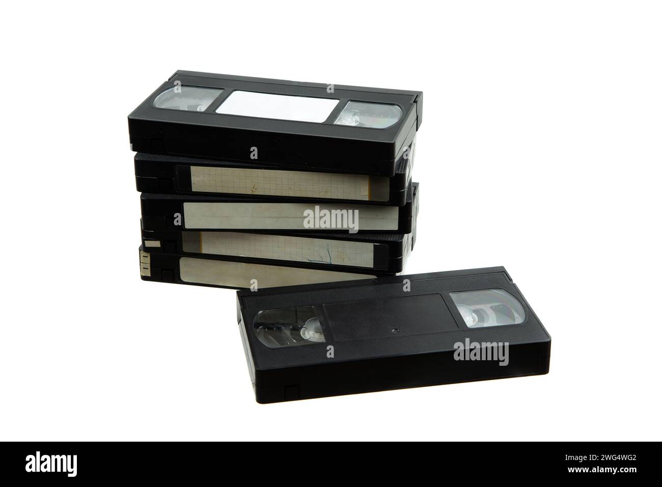 Pile of VHS video cassettes. Vintage media. Isolate on a white ...
