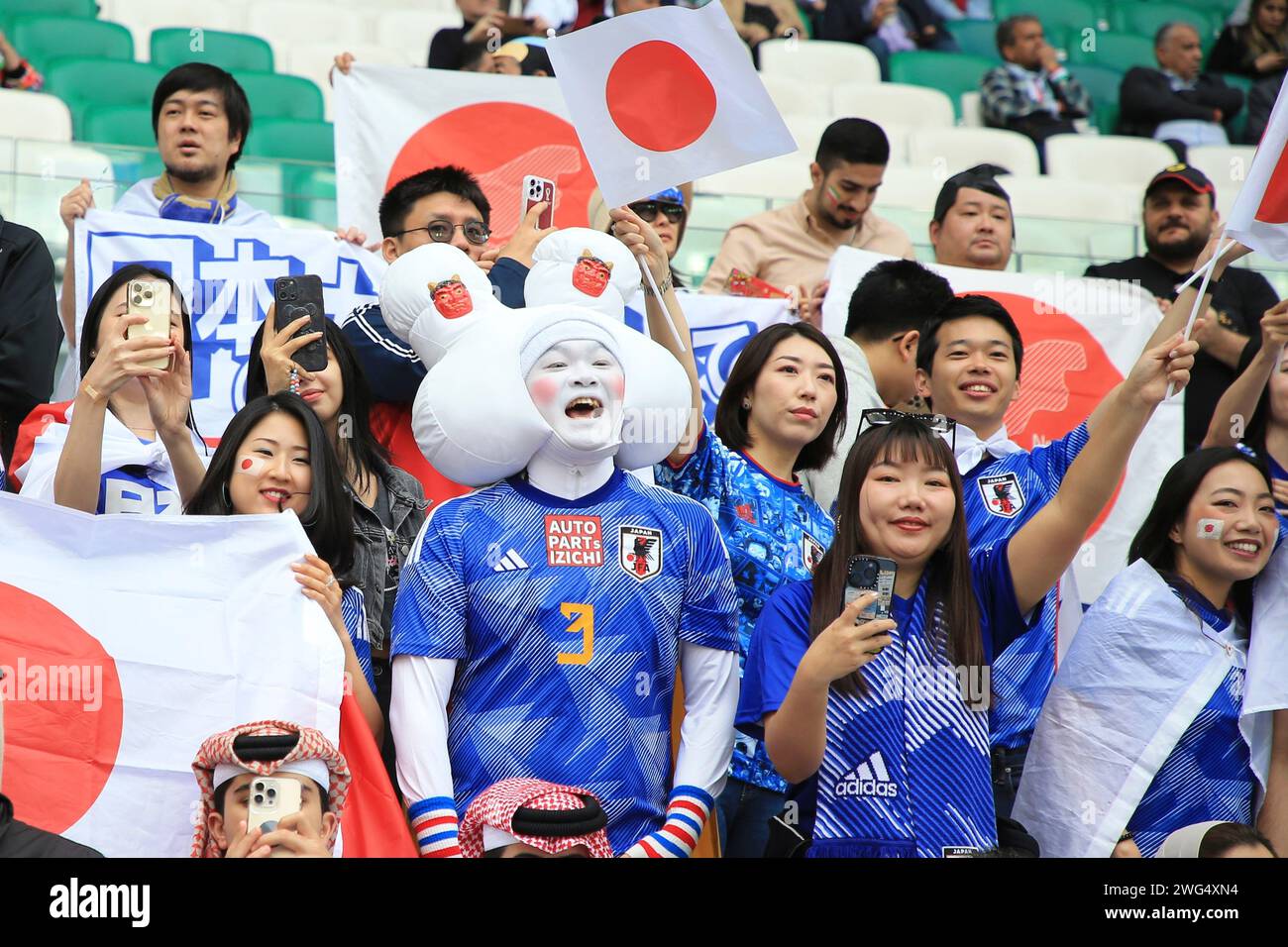 Japanese fans cheer during the Asian Cup quarterfinal soccer match ...