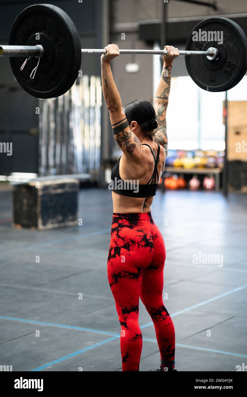 Mature sportive and strong woman bodybuilding in a gym Stock Photo - Alamy