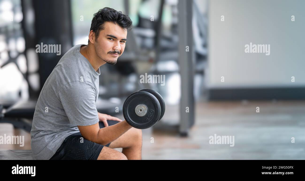 Strength training session captured with a man building muscle with ...