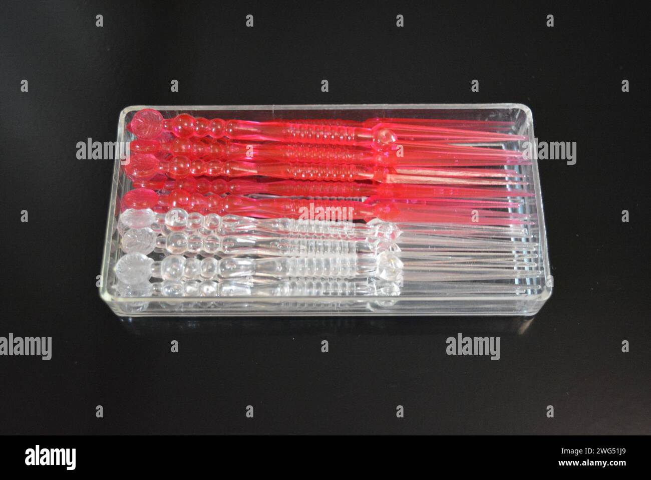 Transparent and red plastic sticks for small sandwiches and canapes in ...