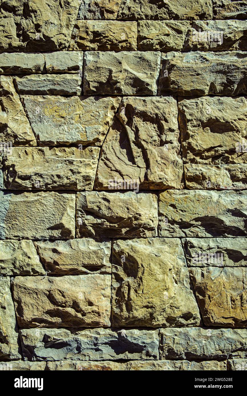 Rough stone wall texture background Stock Photo - Alamy