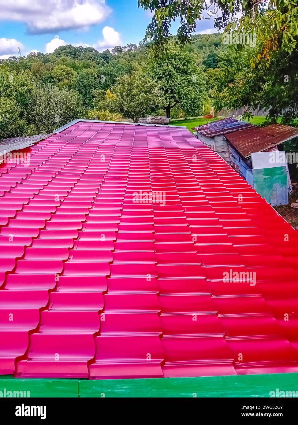 Metal spanish tile roof system. Corrugated metal sheet made of painted ...