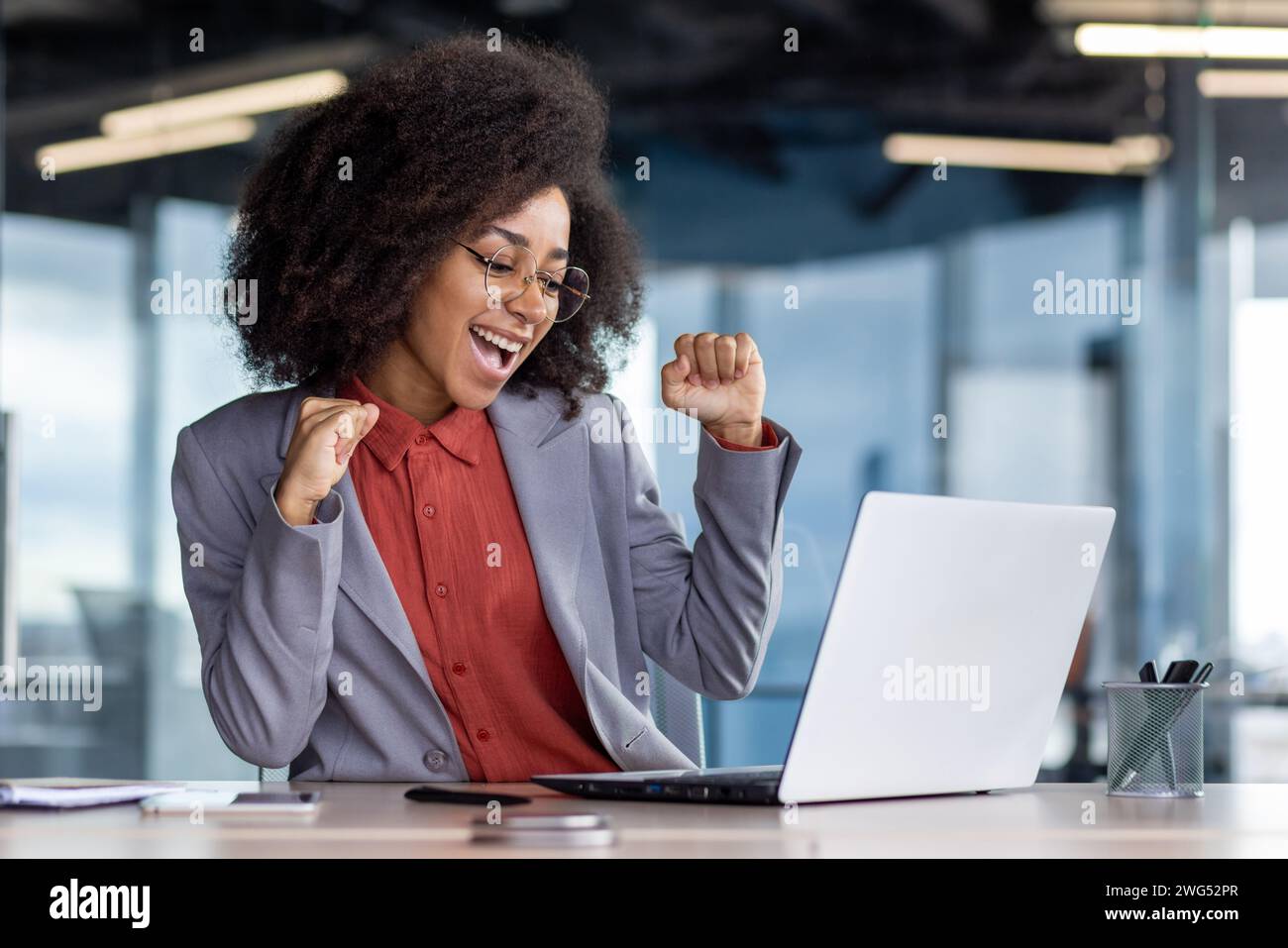 Businesswoman at workplace satisfied received successful achievement ...