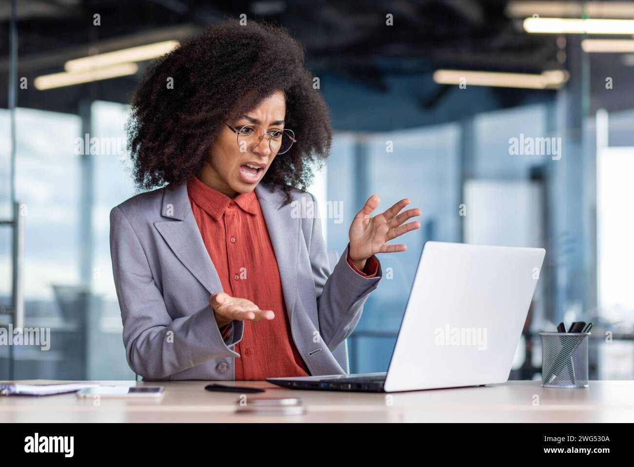 African american woman computer mad hi-res stock photography and images ...