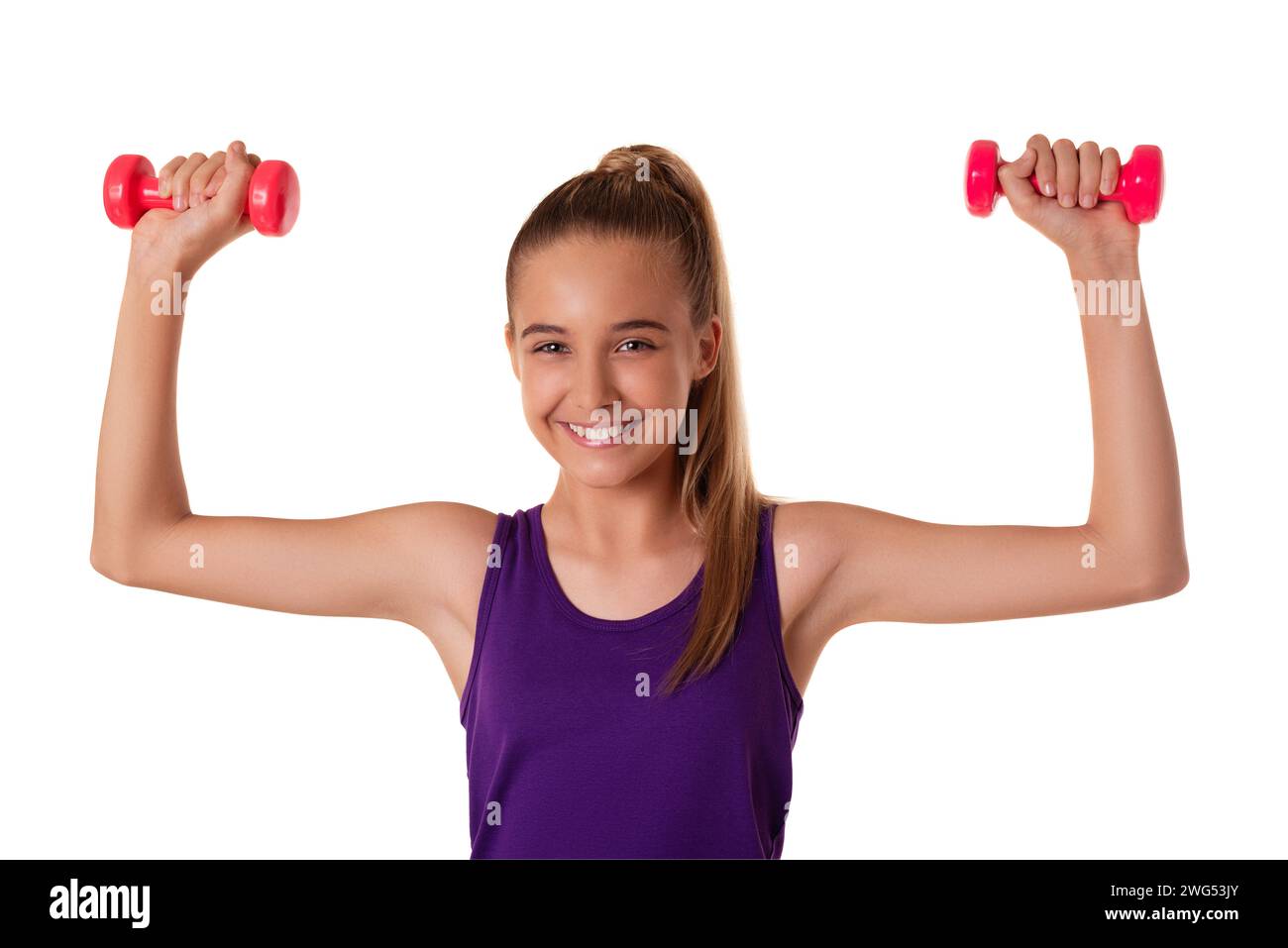 Healthy fitness teen girl doing exercises with dumbbells isolated over ...