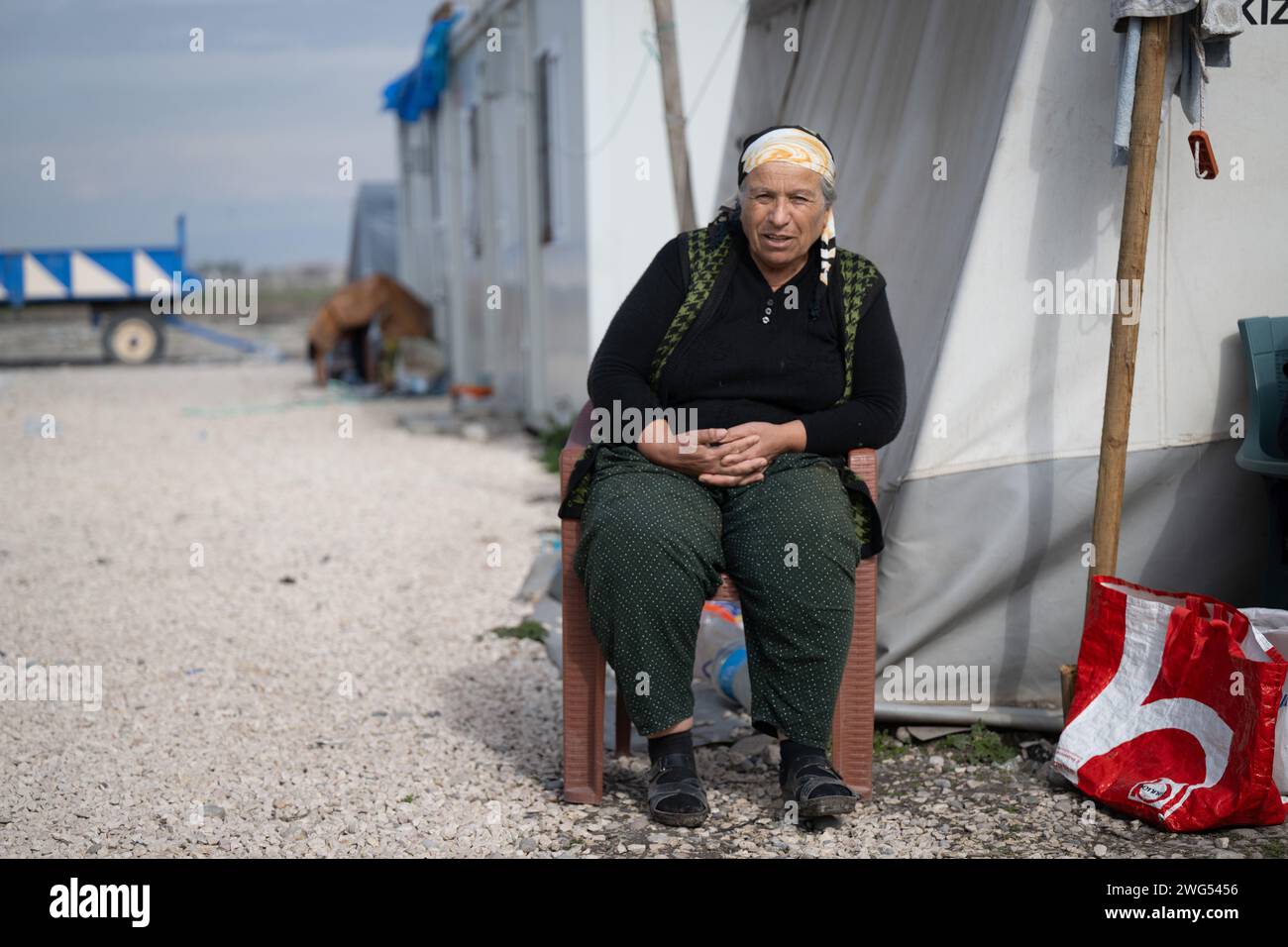 Karacay, Turkey. 03rd Feb, 2024. A woman sits with her plastic chair on ...