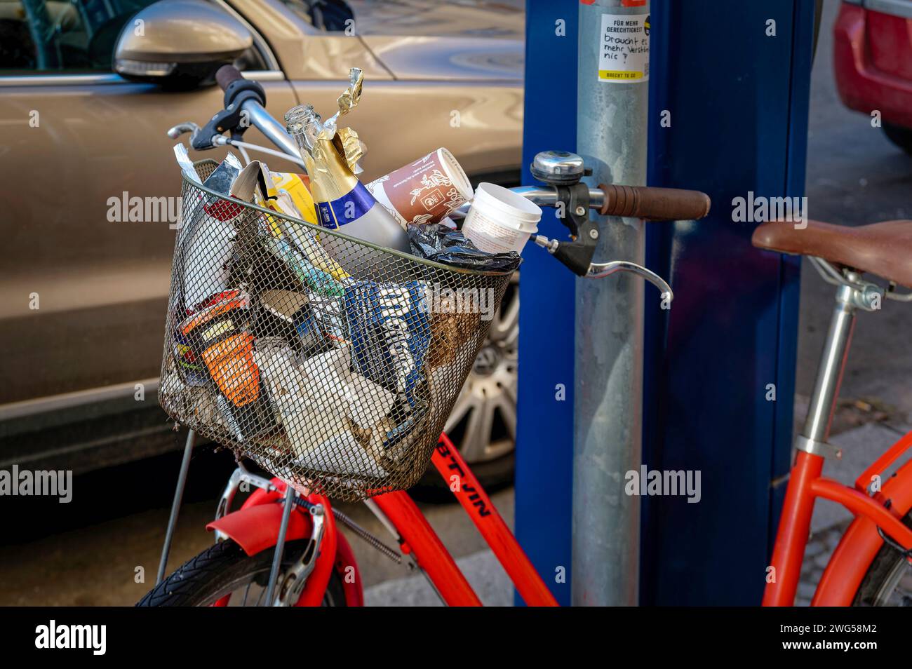 Berlin, Germany - January 28, 2024: Parked bike with people throwing ...