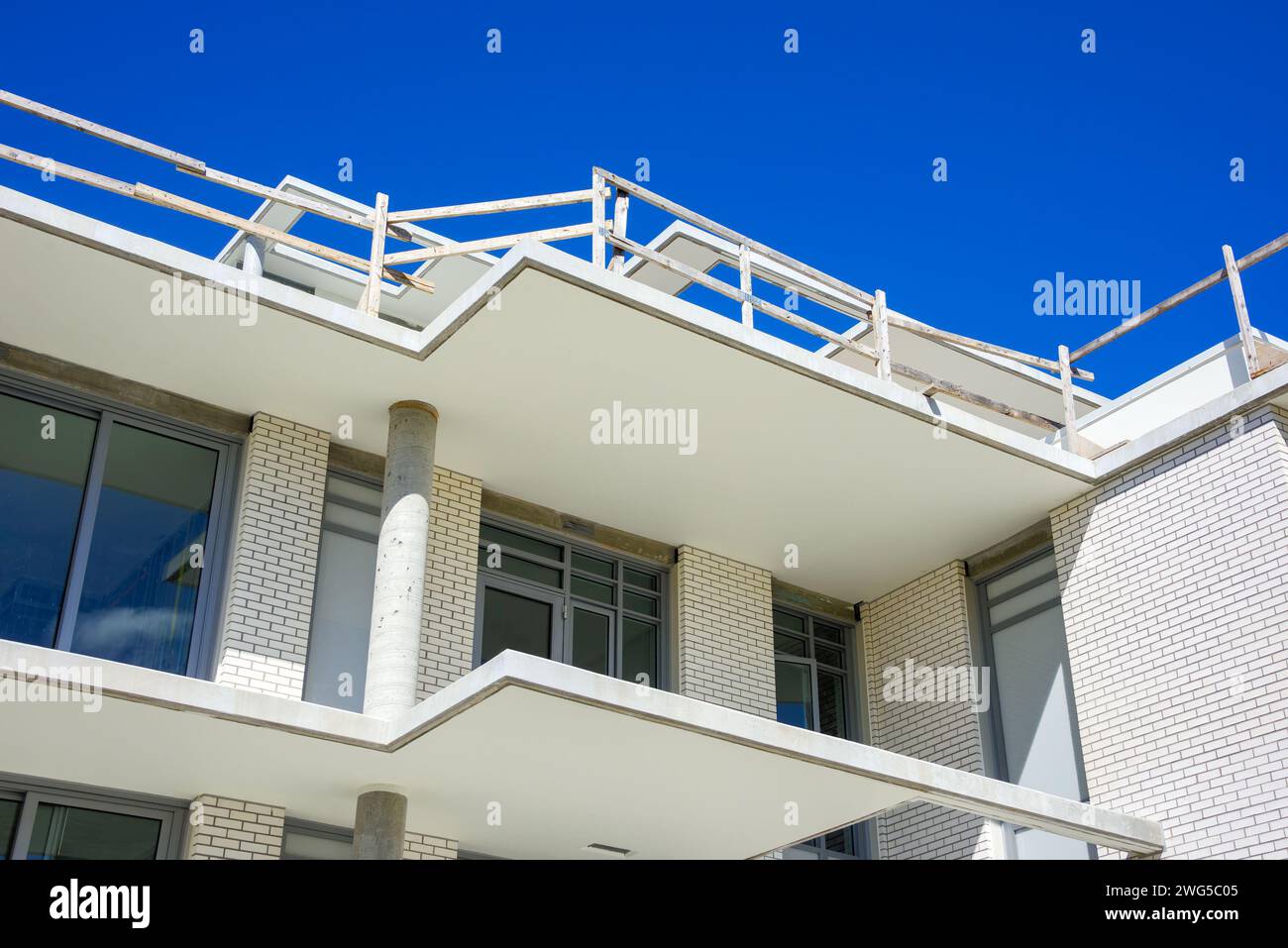 Top of new low-rise residential building under construction Stock Photo ...