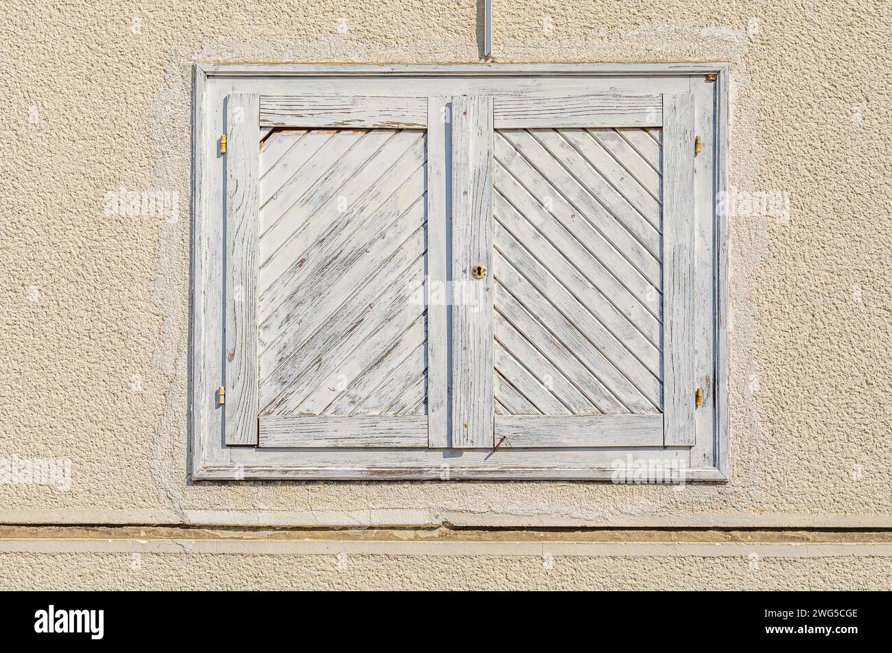 Detail of an old wooden window shutter Stock Photo - Alamy