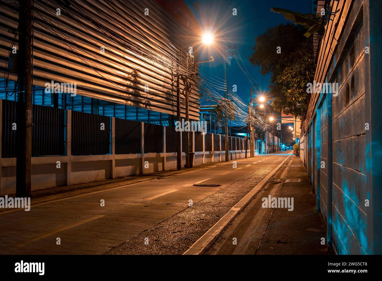empty city road at night with lanterns Stock Photo - Alamy