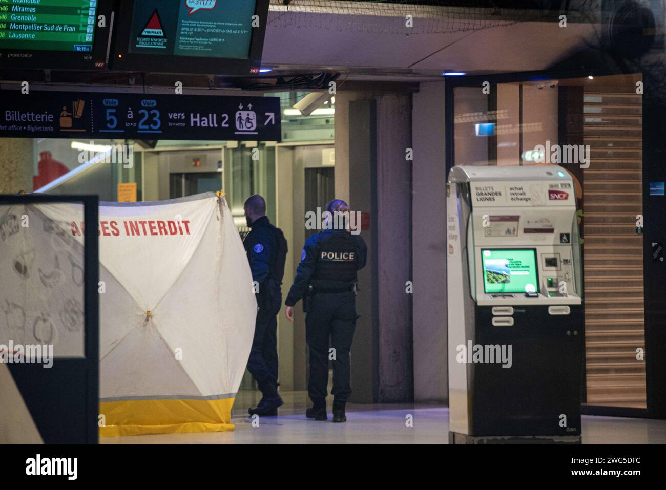 French police stands guard in a hall after a knife attack at Gare de ...