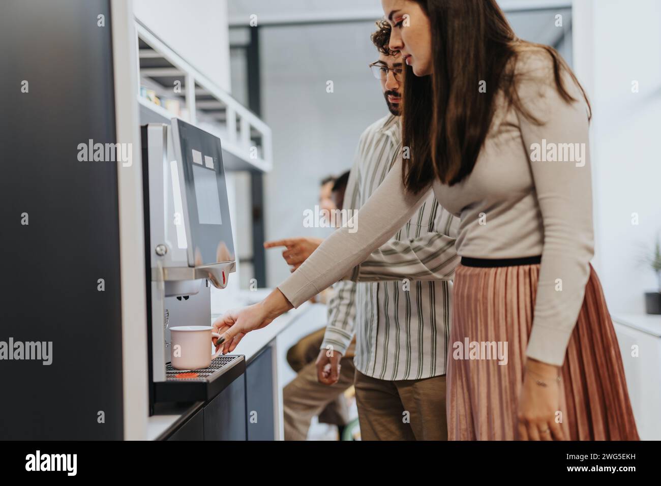 Business woman making her first morning coffee at work Stock Photo - Alamy