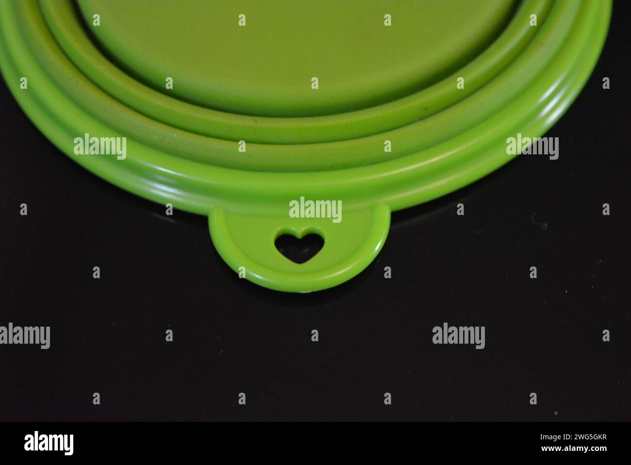 Green folding and multifunctional rubber plate, a bowl with a plastic ...