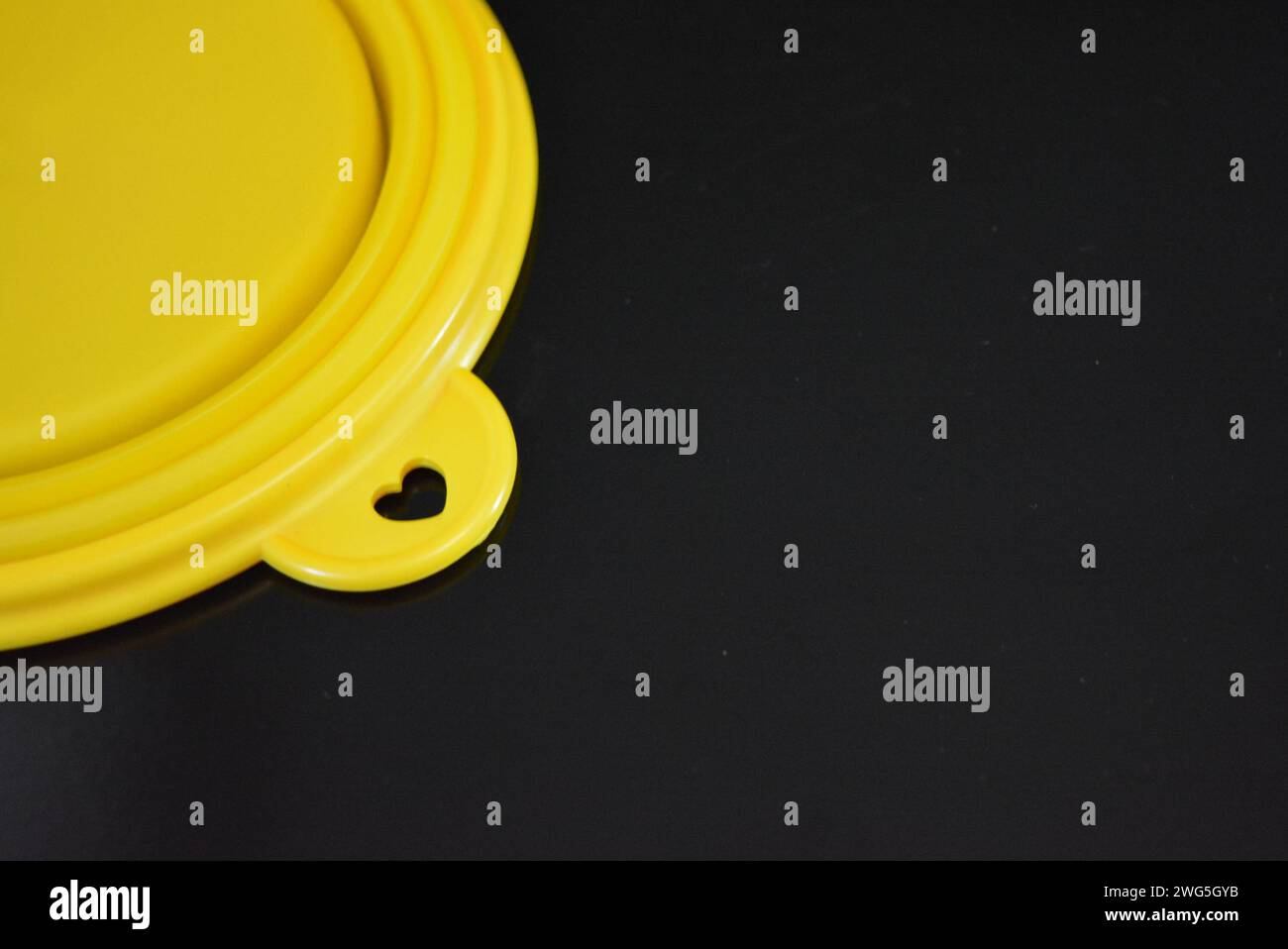 Yellow folding and multifunctional rubber plate, a bowl with a plastic ...