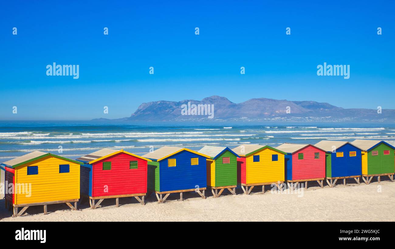 colorful huts on beach by muizenberg with sunny blue sky Stock Photo ...
