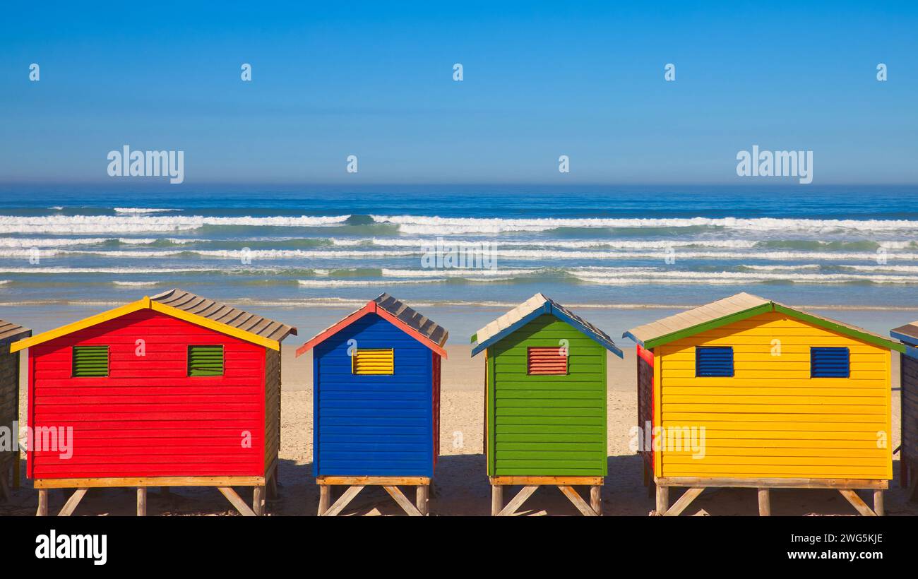 colorful huts on beach by muizenberg with sunny blue sky Stock Photo ...