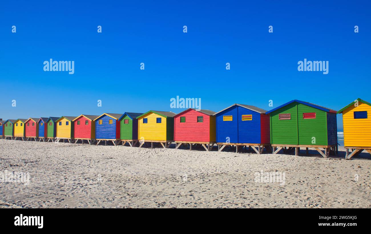 colorful huts on beach by muizenberg with sunny blue sky Stock Photo ...
