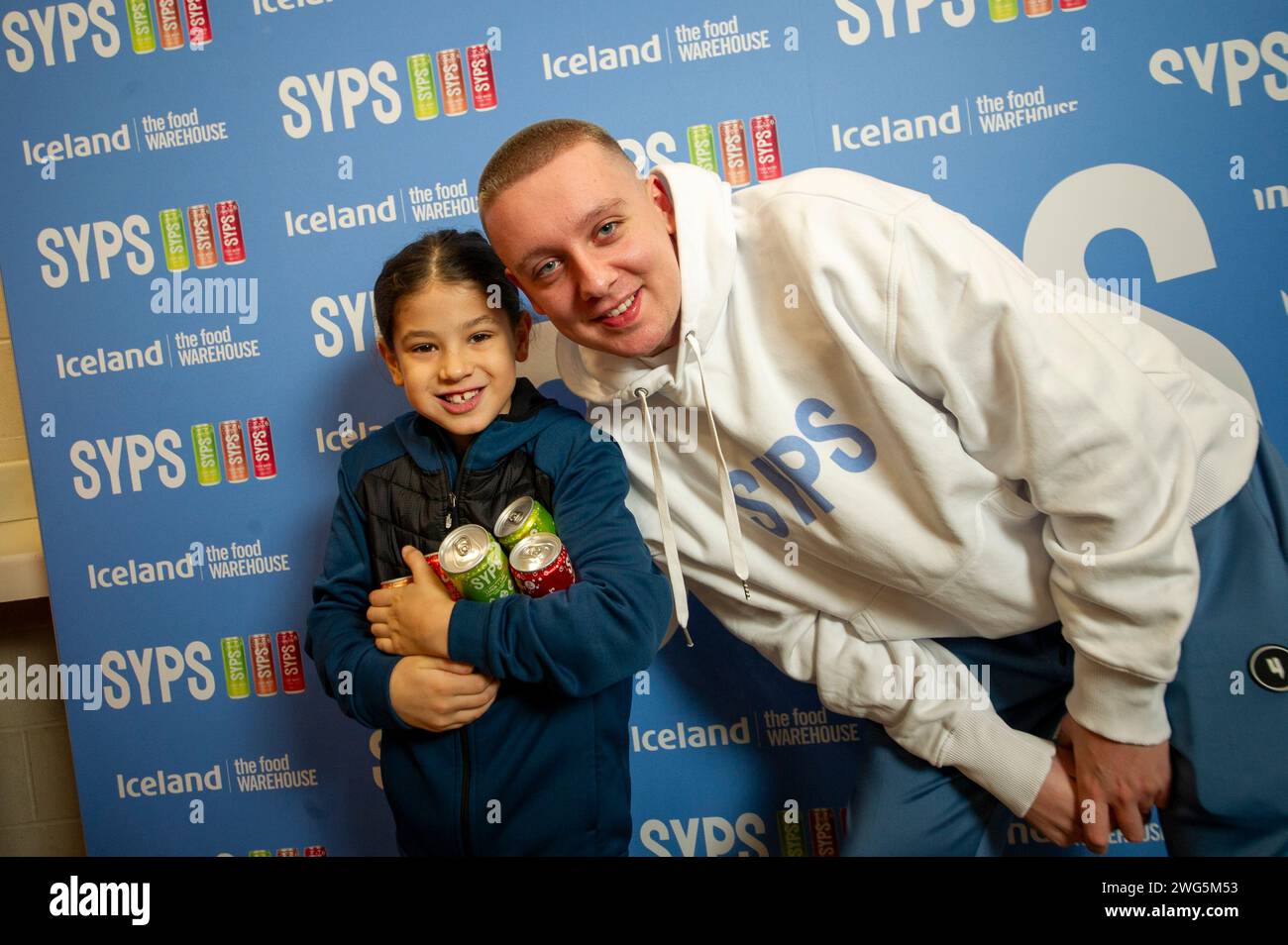 EDITORIAL USE ONLY Fan Lyton Bryan meets rap artist, Aitch, during his ...