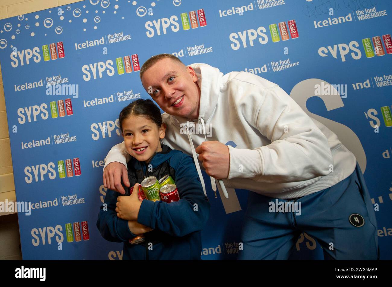 EDITORIAL USE ONLY Fan Lyton Bryan meets rap artist, Aitch, during his ...