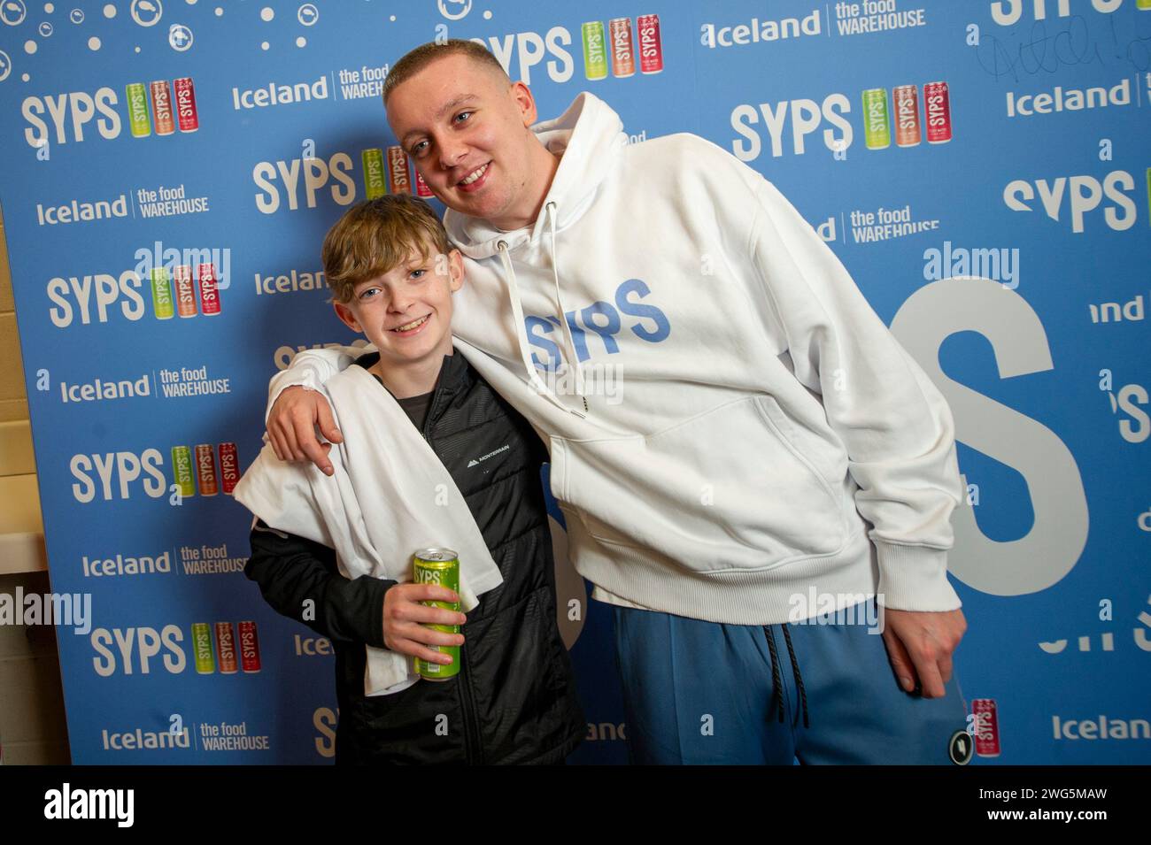 EDITORIAL USE ONLY Fan Lucca Anderton meets rap artist, Aitch, during ...