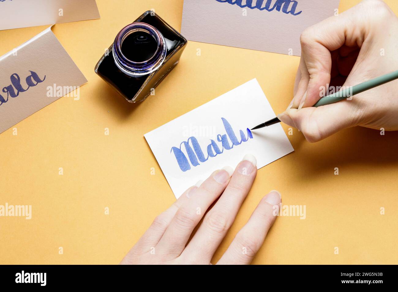 How to make wedding place name cards with handwritten letters and fresh ...