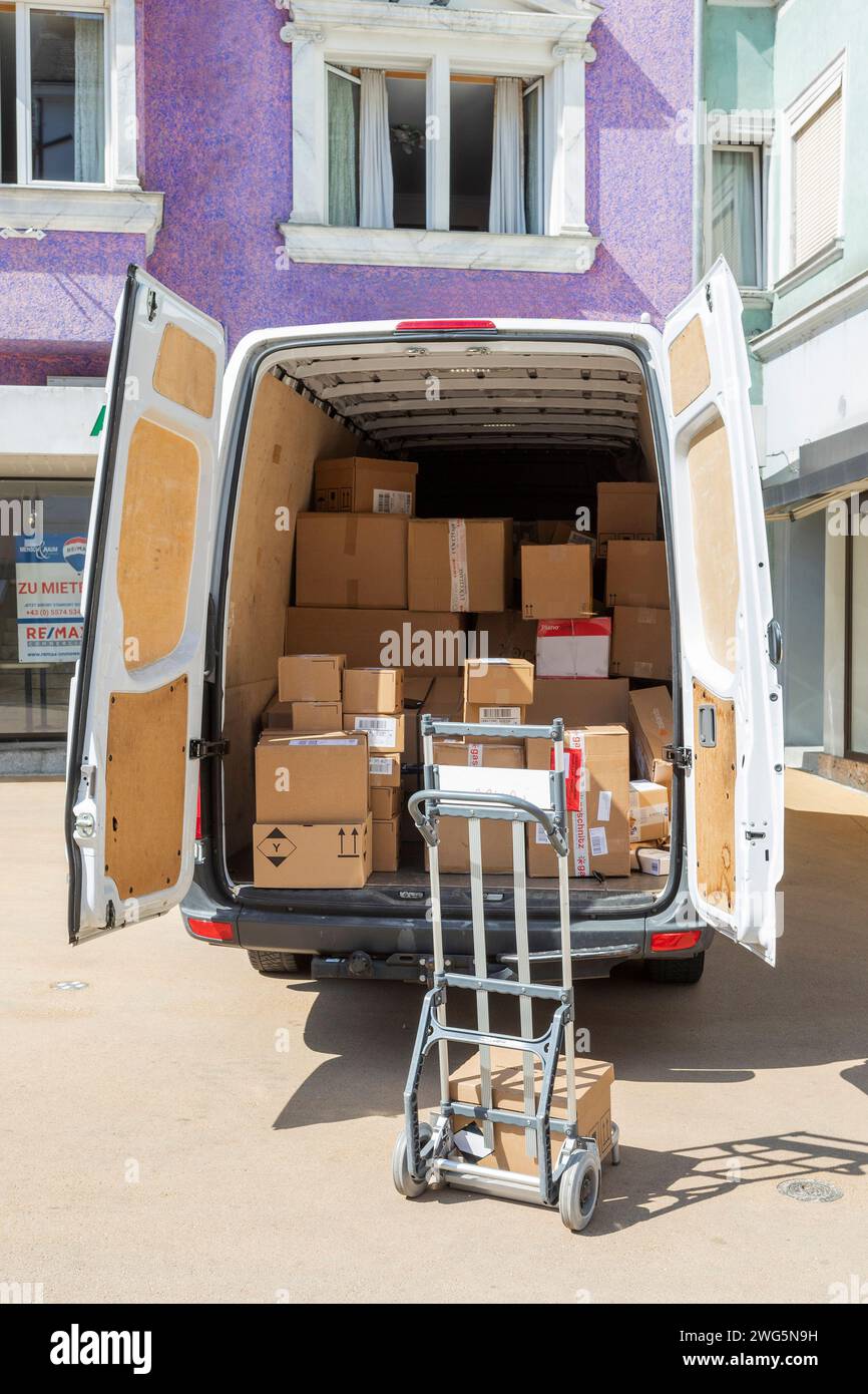 Parcel delivery vehicles hi-res stock photography and images - Alamy