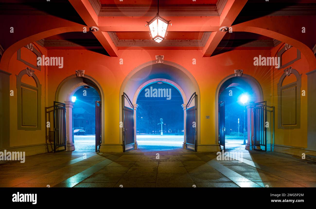 arched passage in the night city illuminated by lights Stock Photo - Alamy