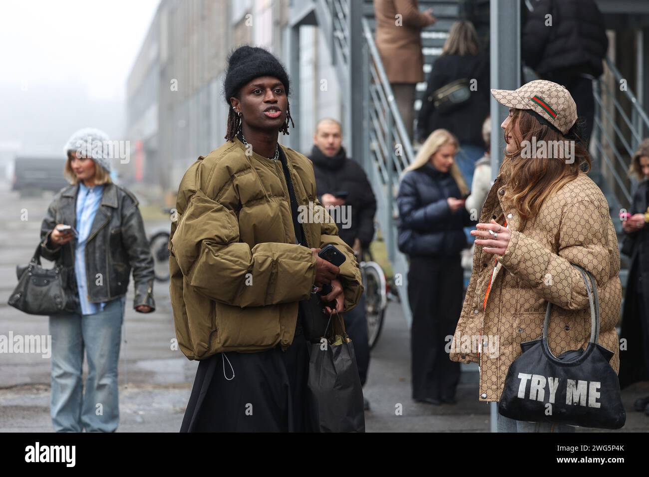 Fashionistas pose for photographers before the Stamm AW 2024 fashion ...