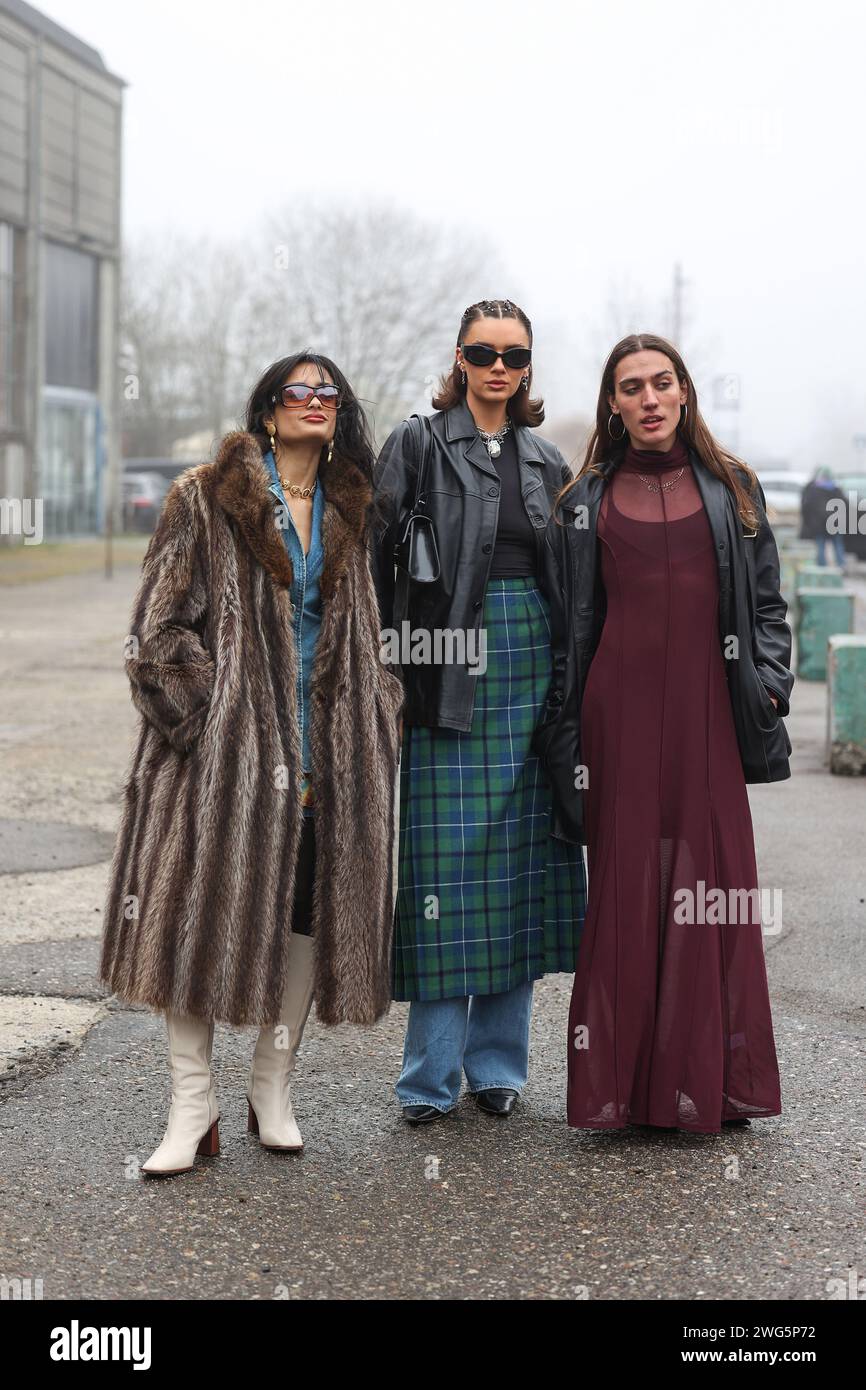 Fashionistas pose for photographers before the Stamm AW 2024 fashion ...
