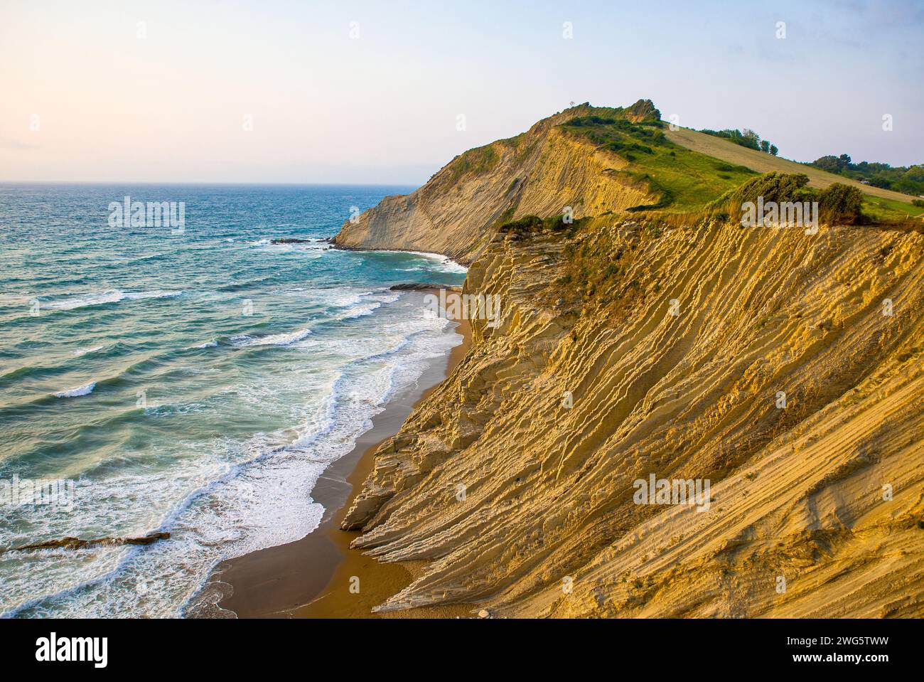view of the flysch rocks in the bay of zumaia and the beach itzurun ...