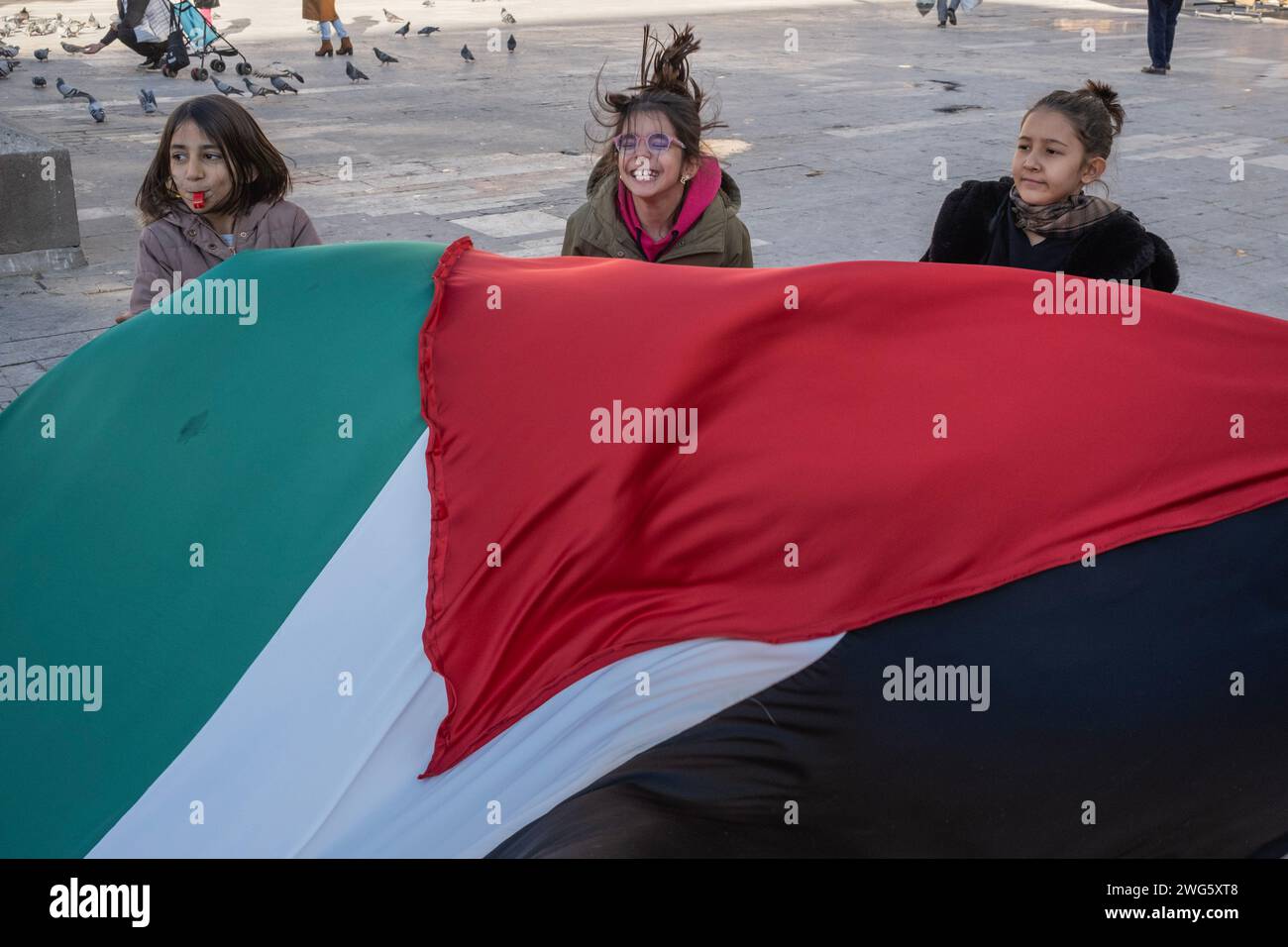 Ankara, Turkey. 06th Jan, 2024. Children hold a Palestinian flags ...