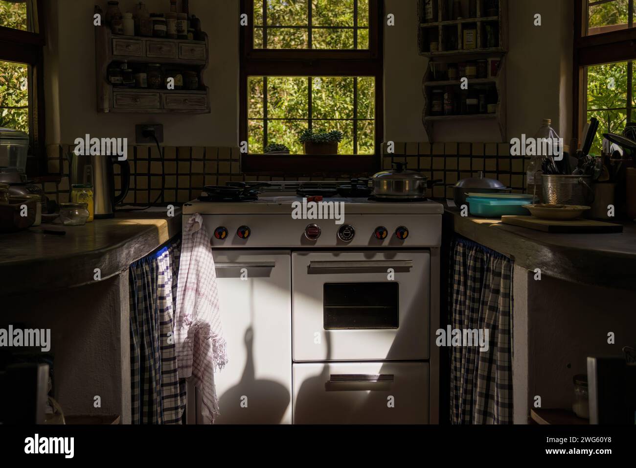 General view of a farm house kitchen with a vintage stove, with the ...