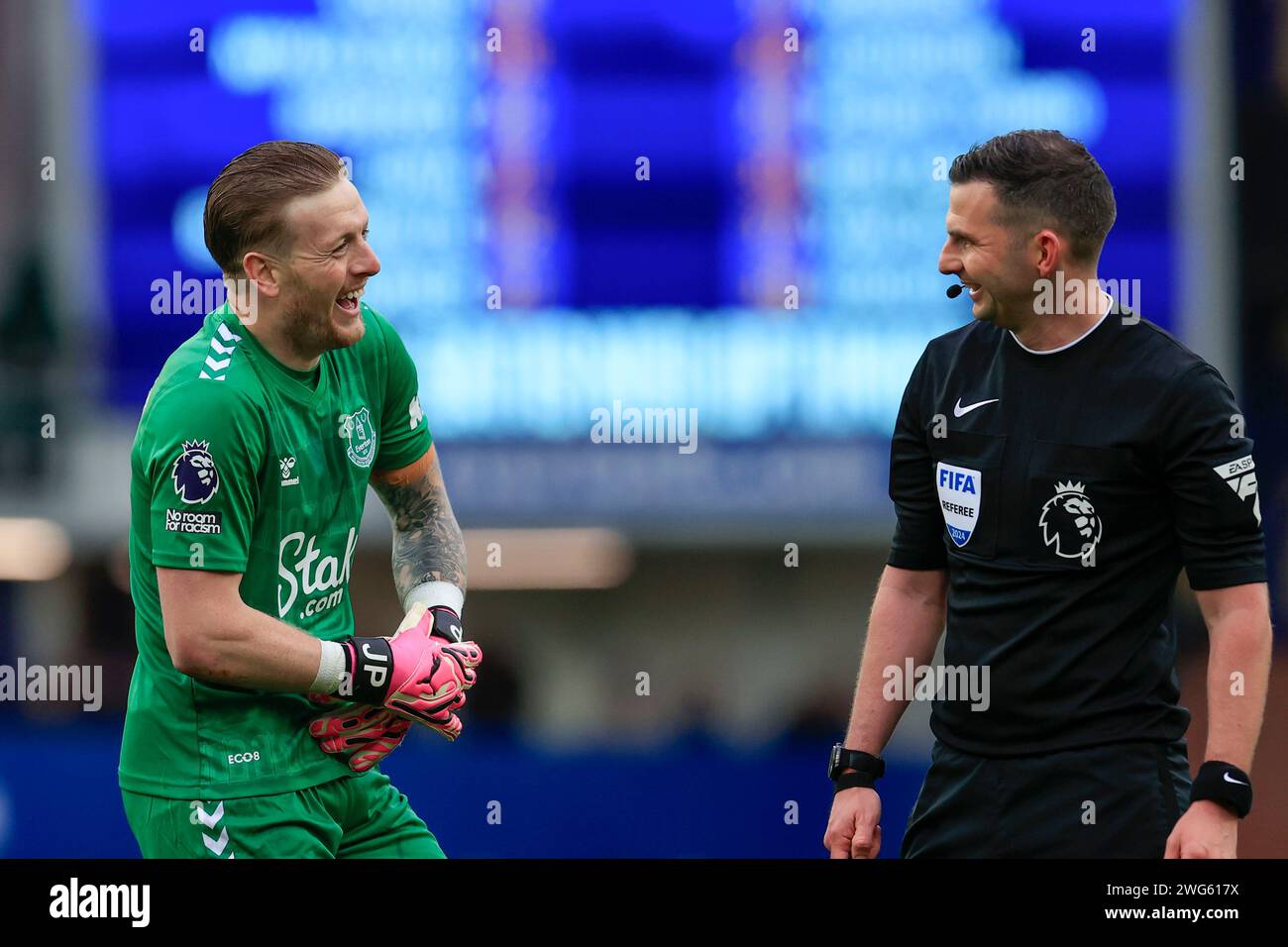 Jordan Pickford of Everton and referee Michael Oliver have a laugh ...