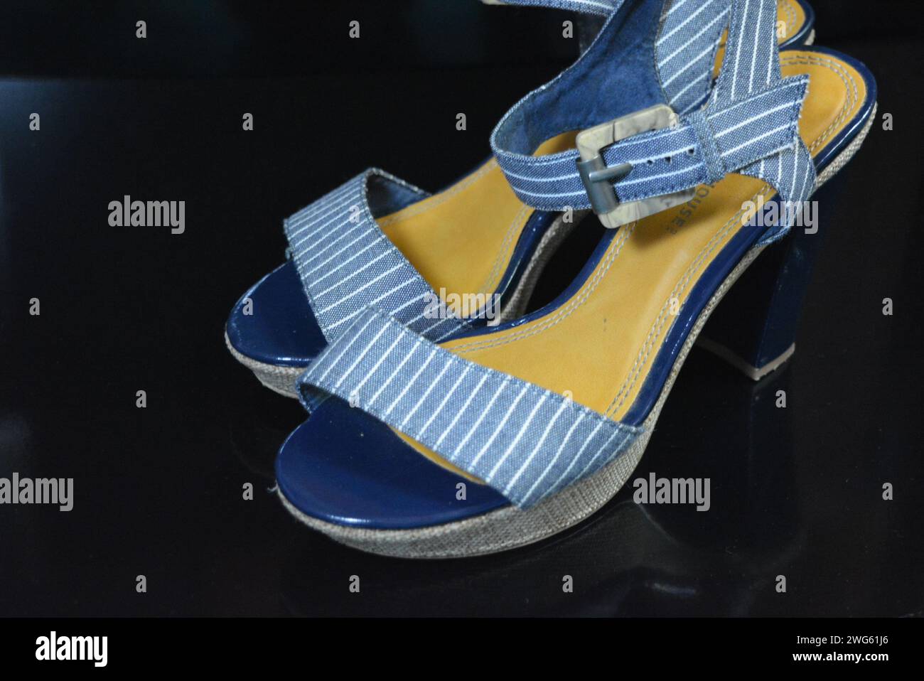 Stylish and unusual women's shoes made of blue genuine patent leather ...