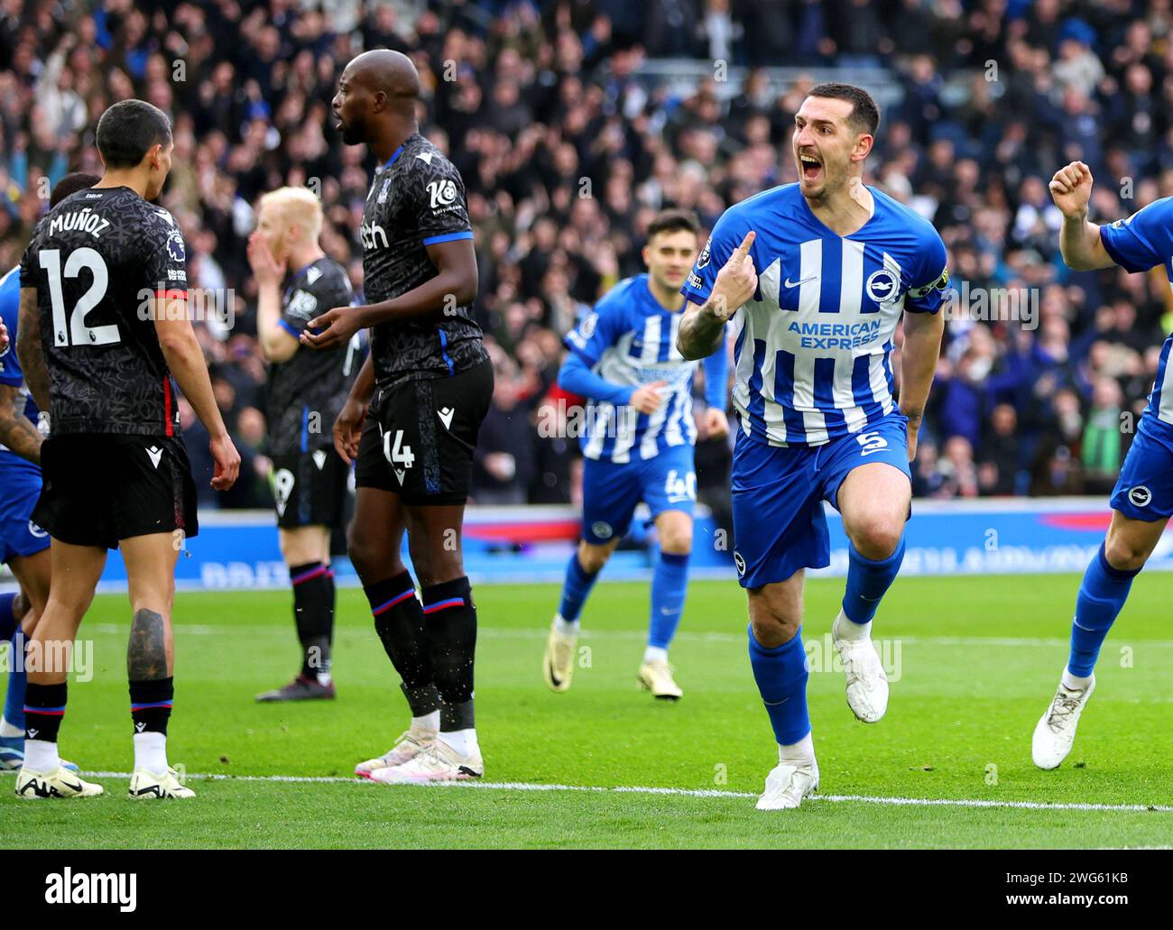 Brighton and Hove Albion's Lewis Dunk celebrates scoring their side's ...