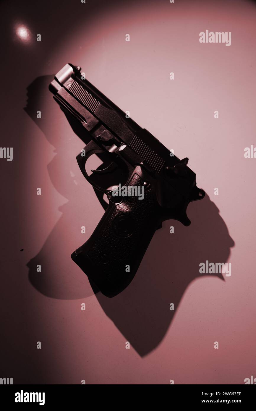 Pistol gun artistic photograph book cover design Stock Photo - Alamy