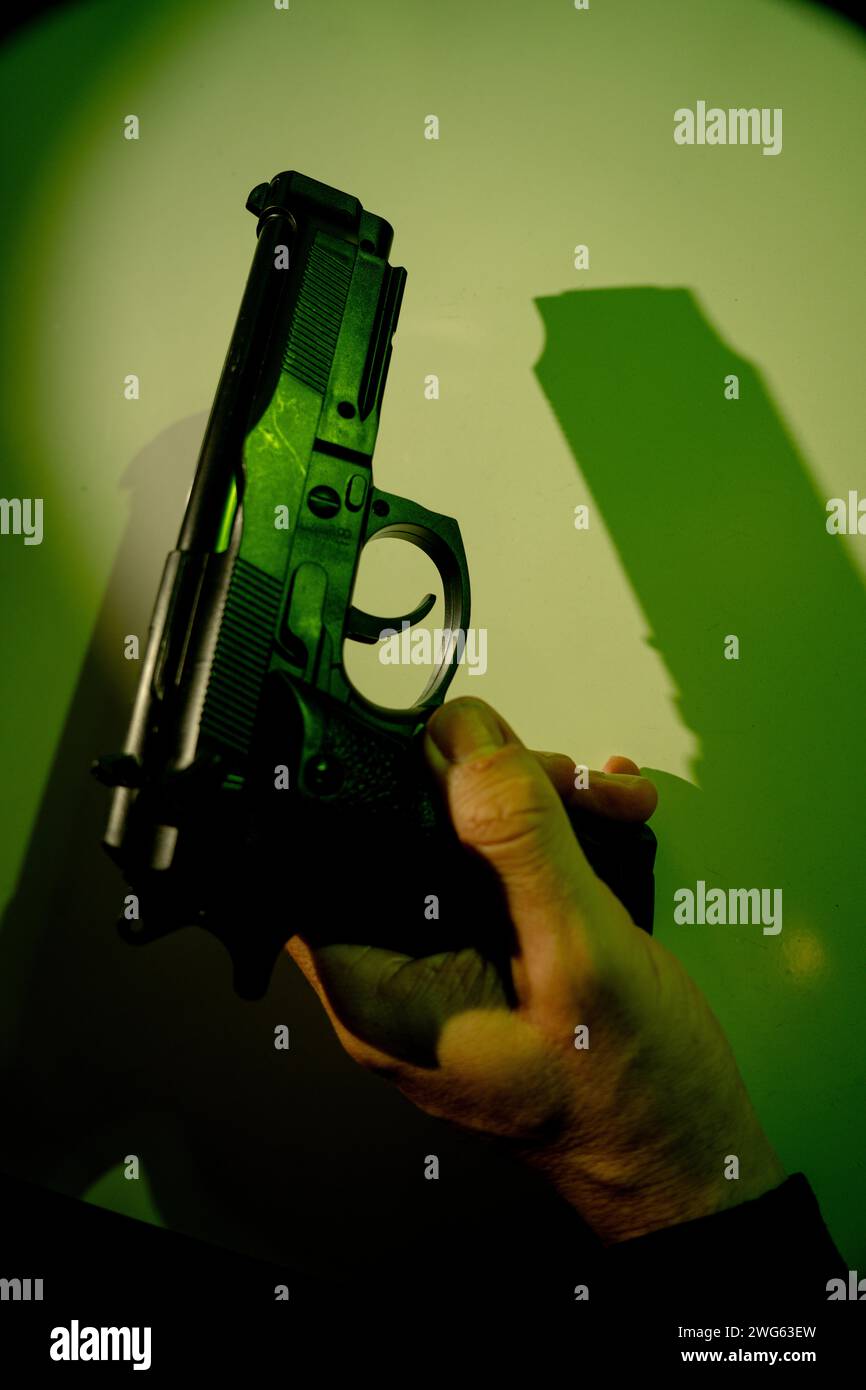 Pistol gun artistic photograph book cover design Stock Photo - Alamy