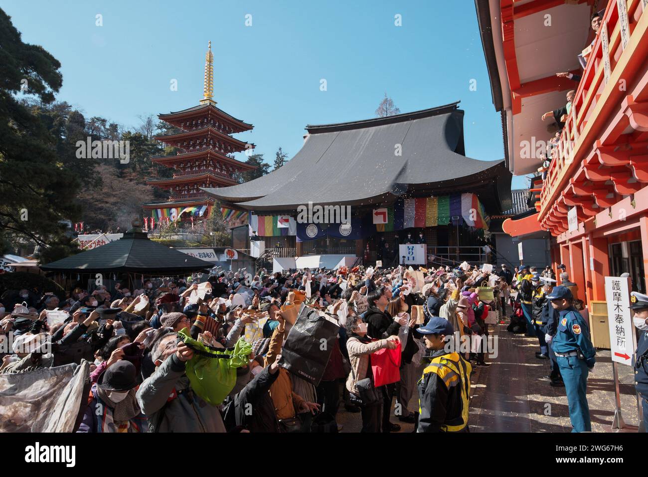 Tokyo, Japan. 03rd Feb, 2024. People try to catch lucky beans during ...