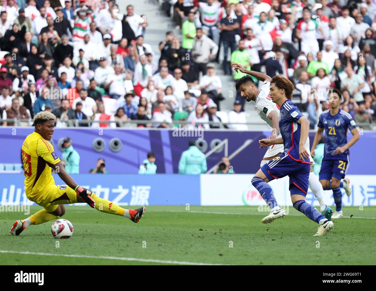 Doha, Qatar. 3rd Feb, 2024. Iran's Mohammad Mohebbi (2nd L) shoots to ...