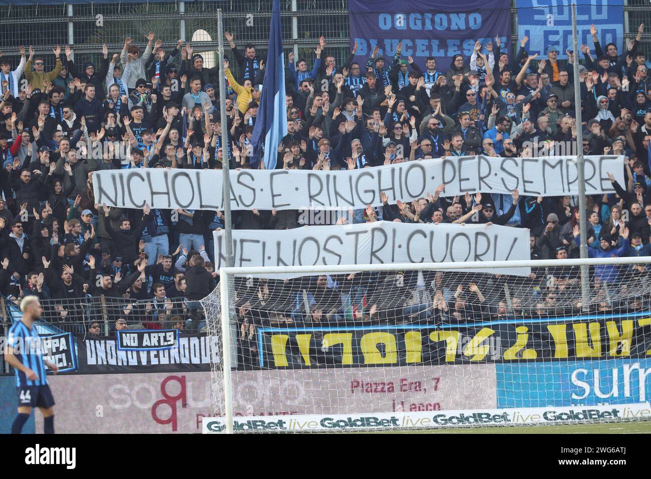 Lecco, Italy. 03rd Feb, 2024. Fans of Lecco with a banner for two young ...