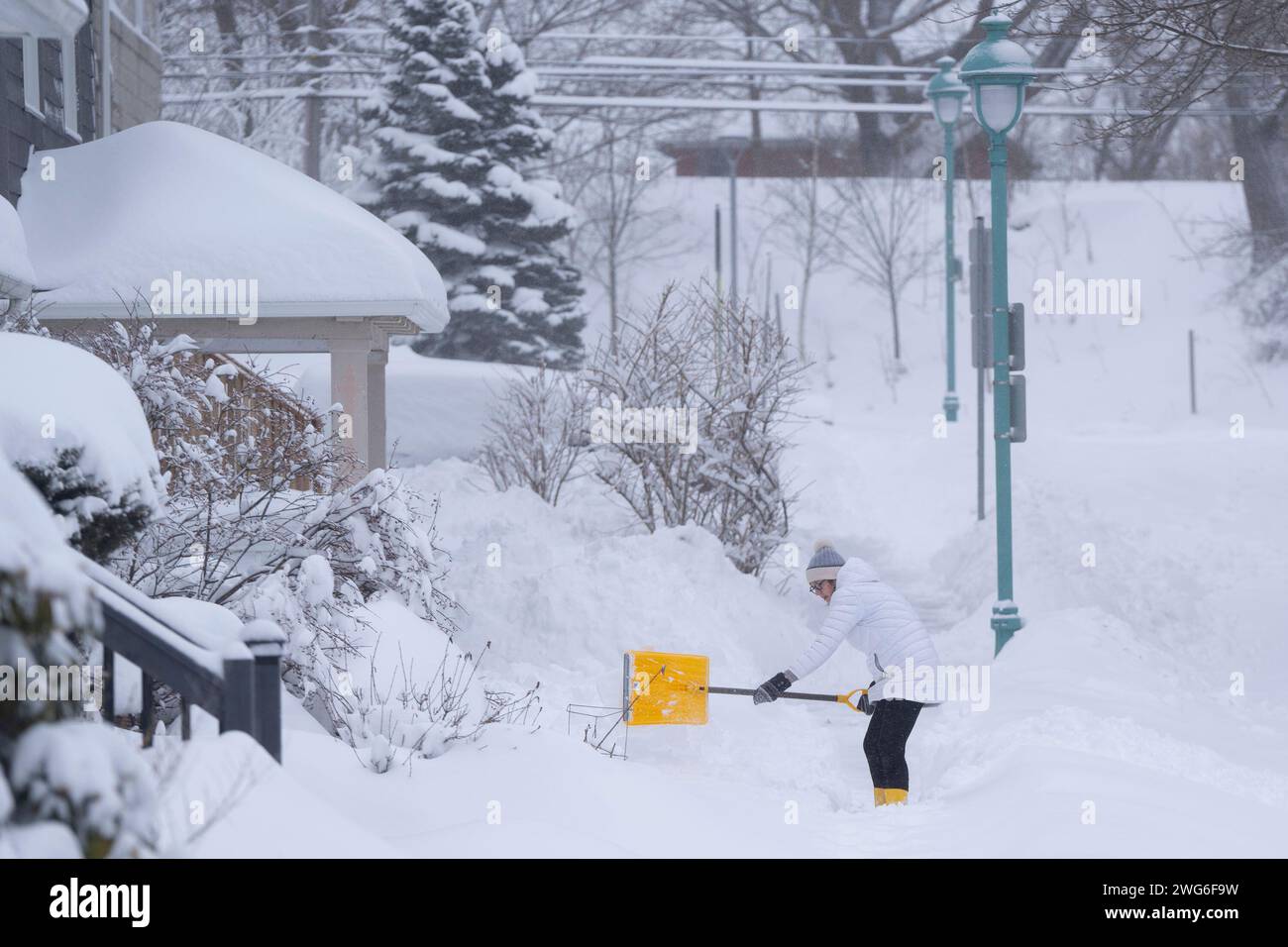 A person shovels snow in Halifax on Saturday, Feb. 3, 2024. Environment ...