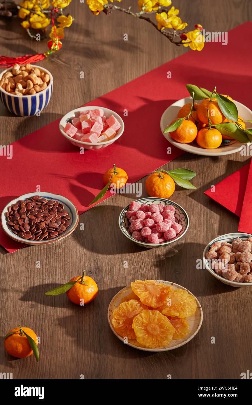 Apricot blossom, nuts, mandarin oranges and many kinds of dried candied ...